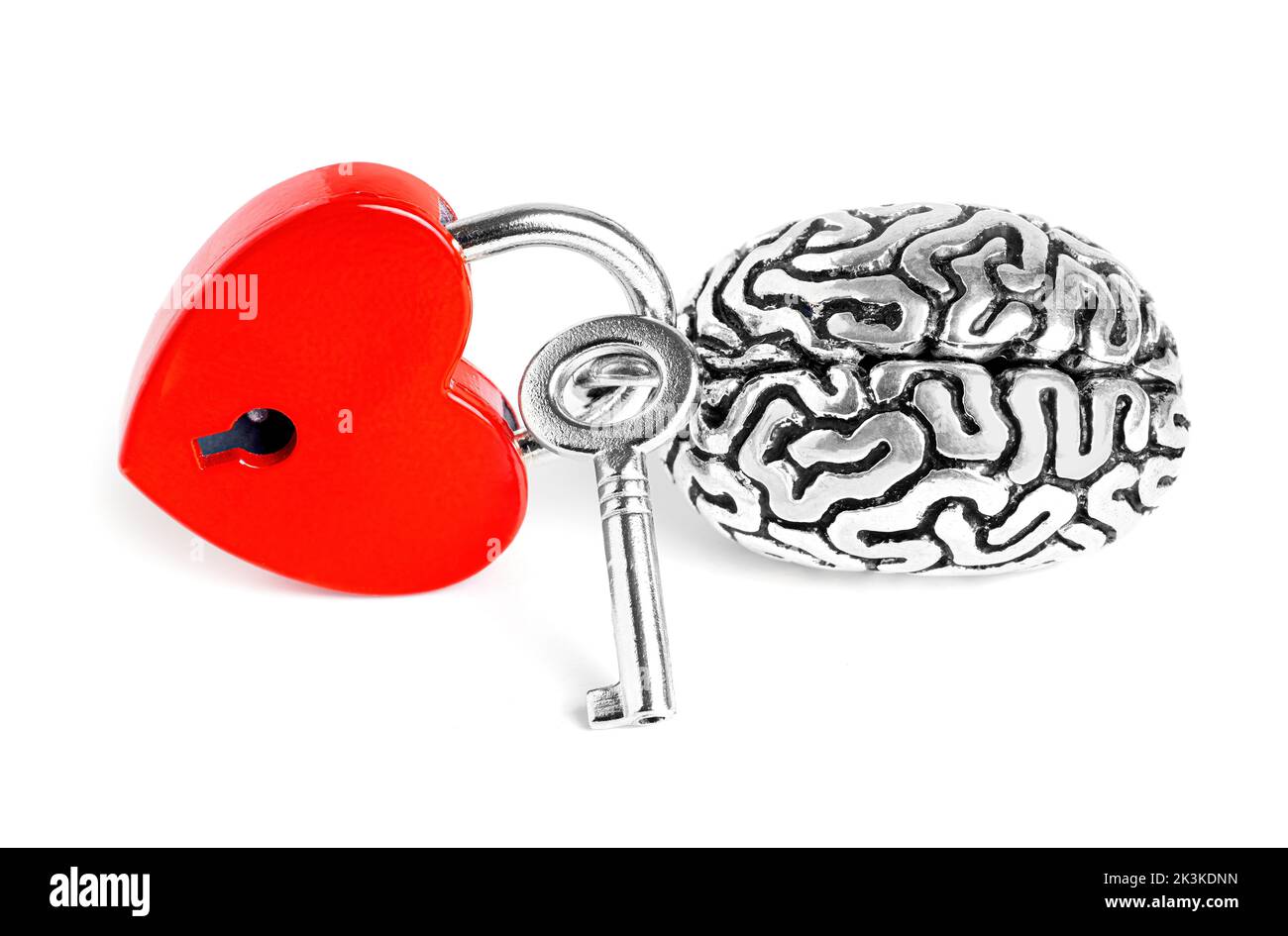 Human brain linked to a red heart-shaped padlock with a key isolated on ...