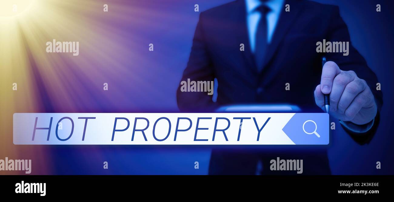 Sign displaying Hot Property, Word Written on Something which is sought ...