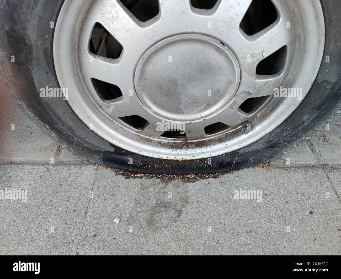 Rubber wheel punctured hi-res stock photography and images - Alamy