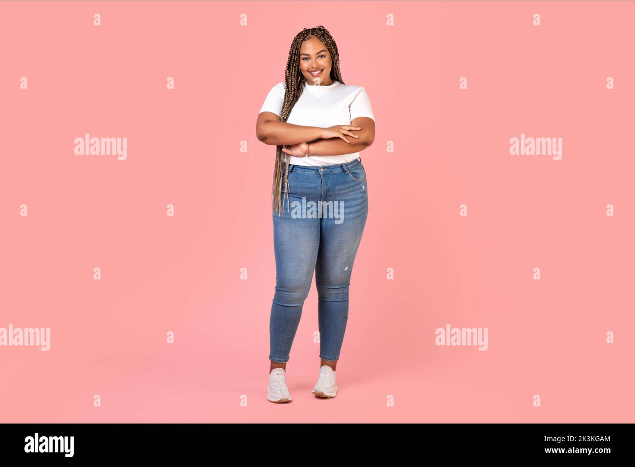 Attractive Black Plus Size Woman Model Standing Over Pink Background ...