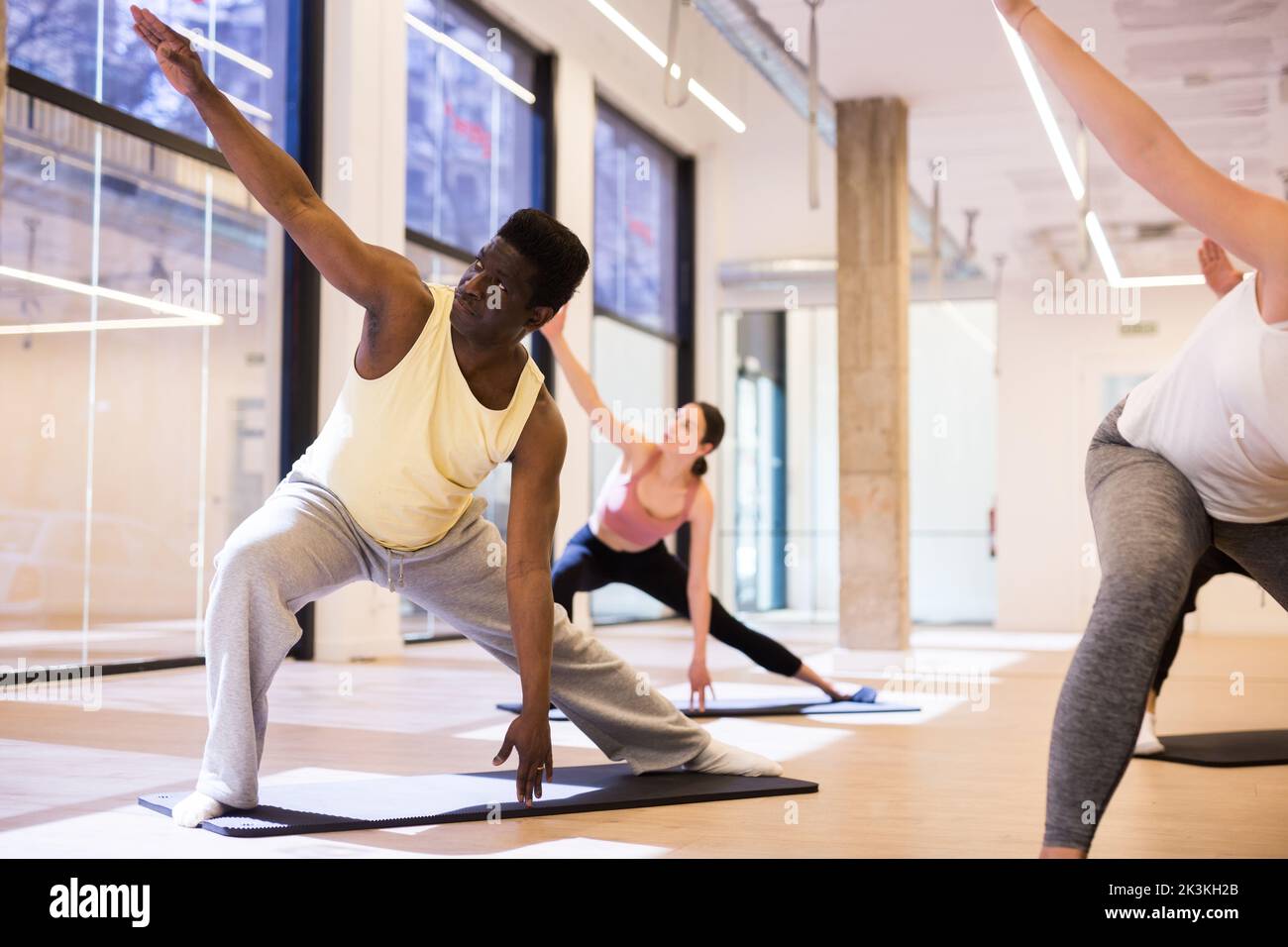 African american man performing stretching hi-res stock photography and ...
