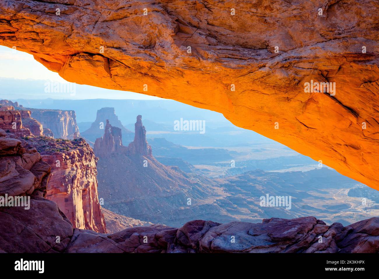 Mesa Arch at sunrise with the Washer Woman Arch, Monster Tower ...