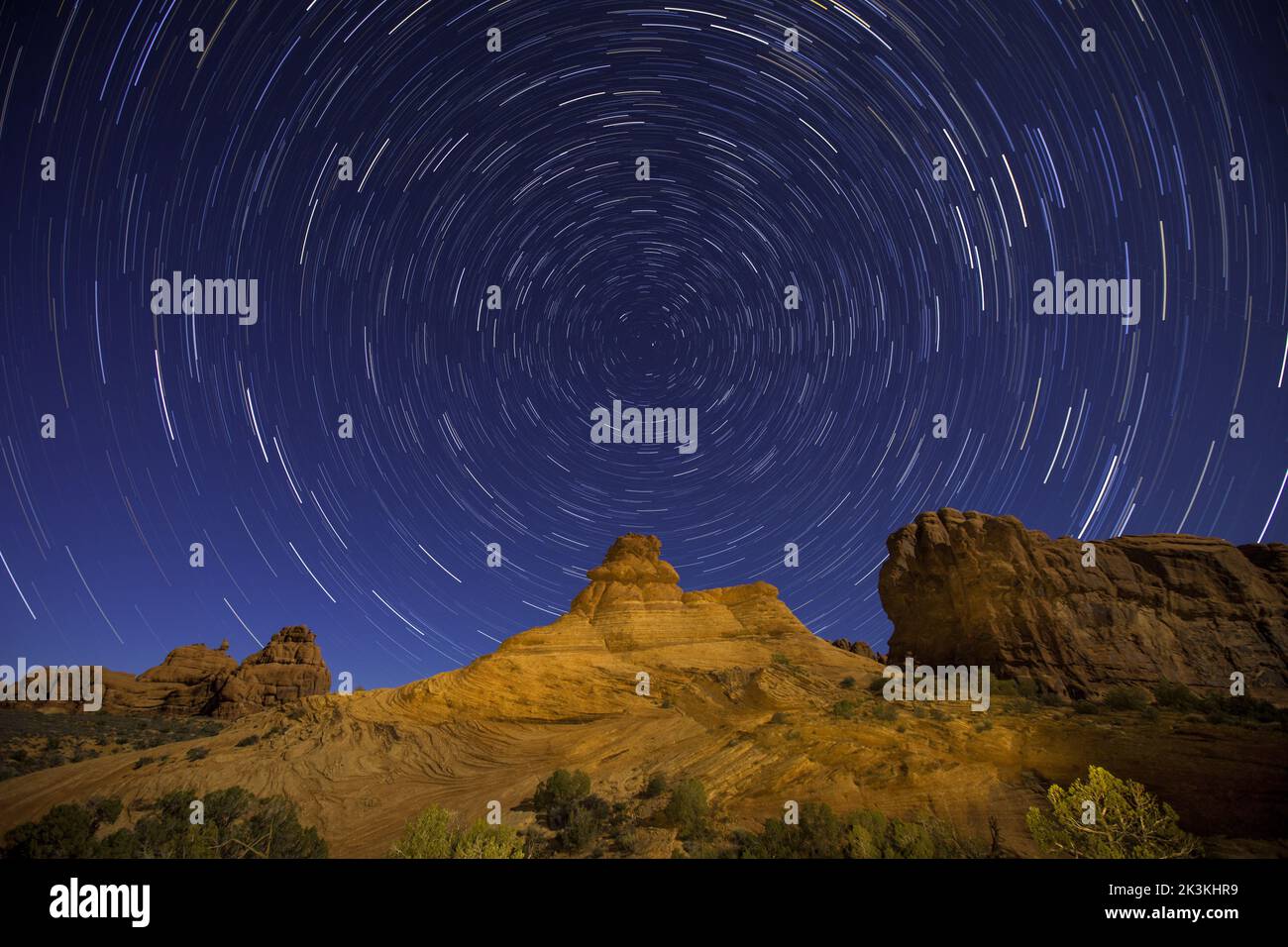 Star trails rotating around the North Star over a sandstone pyramid ...