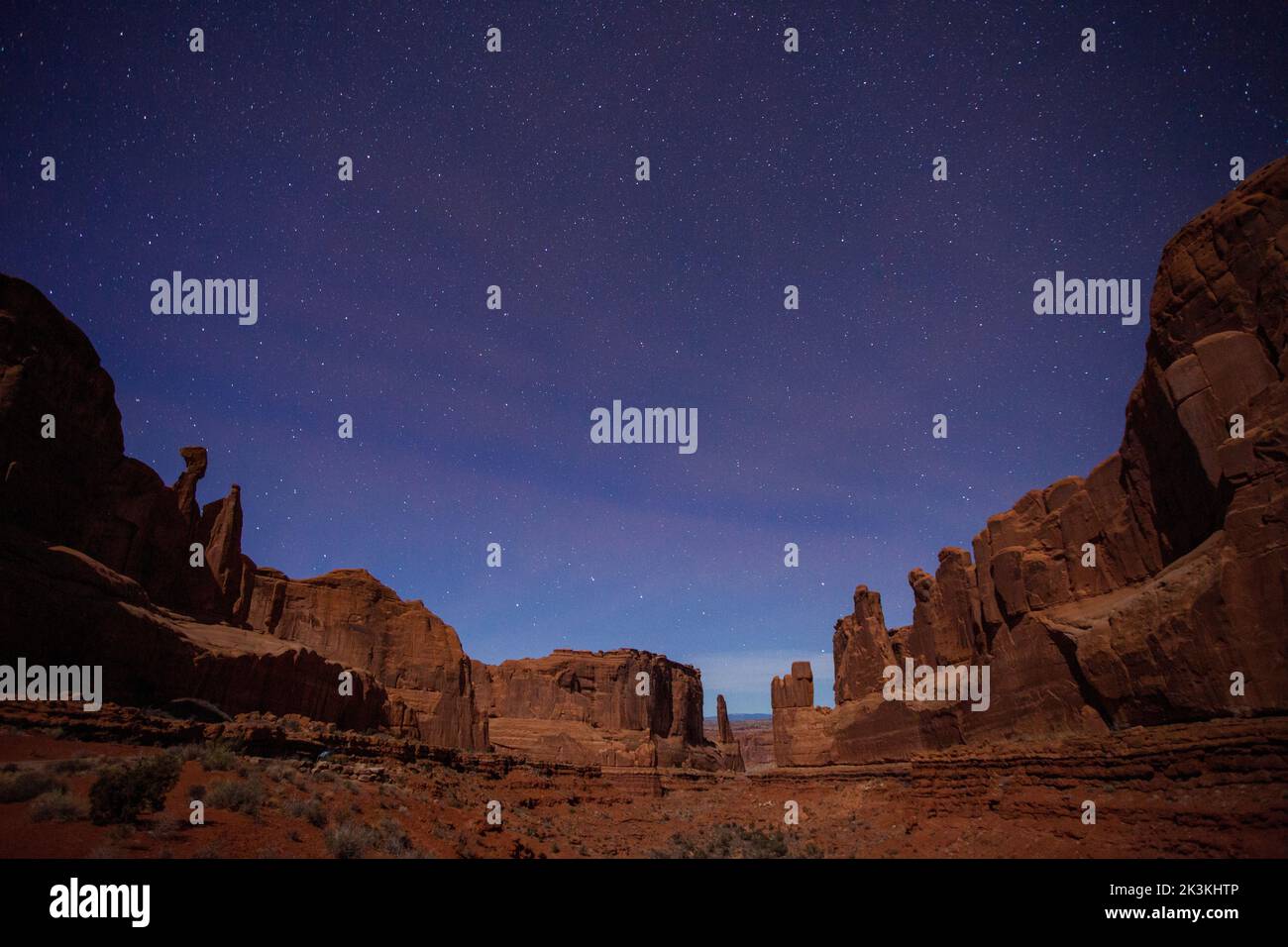 Queen Nefertiti Rock and canyon walls of Park Avenue with stars at ...