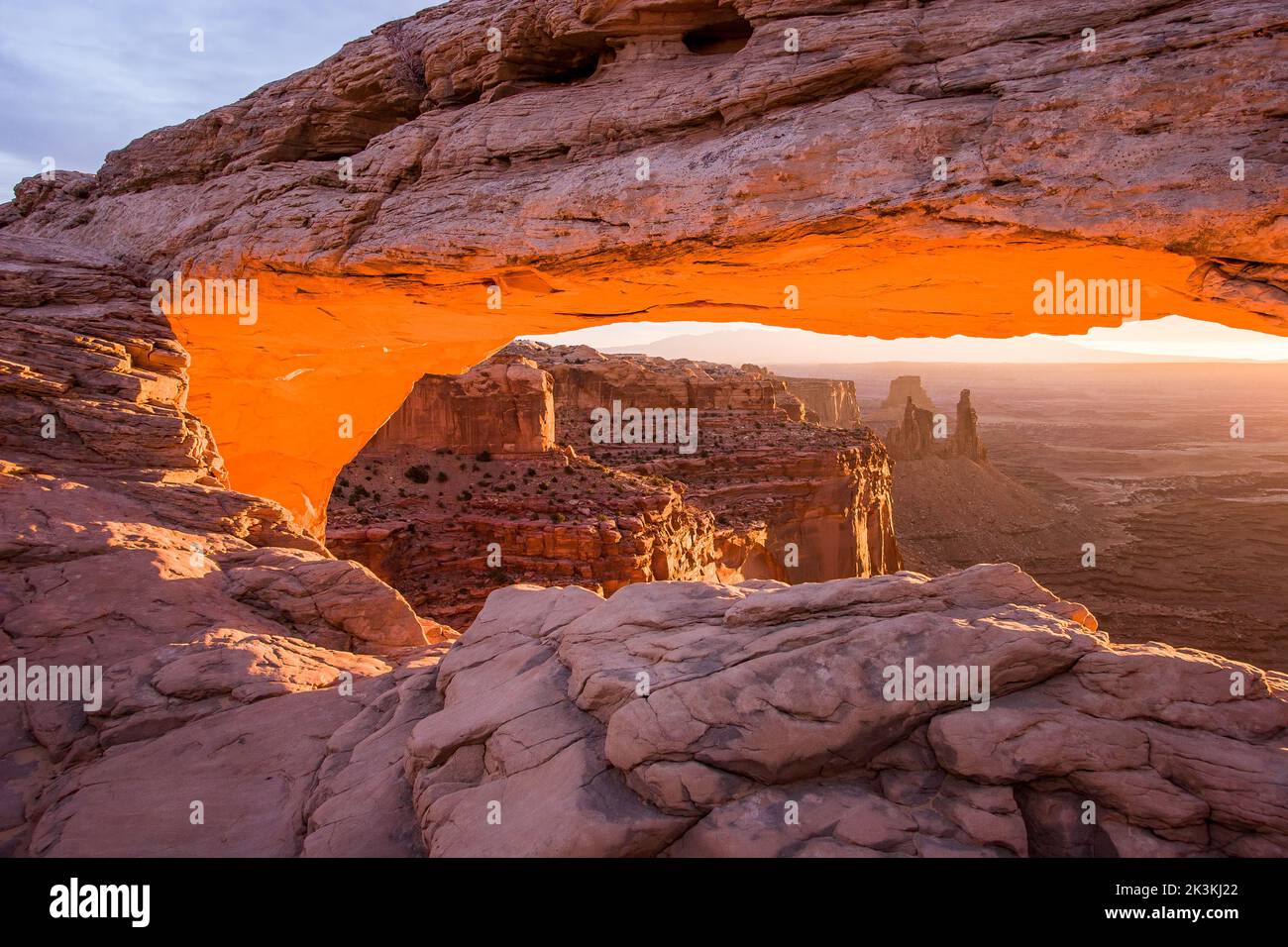 Mesa Arch at sunrise with the Washer Woman Arch, Monster Tower ...