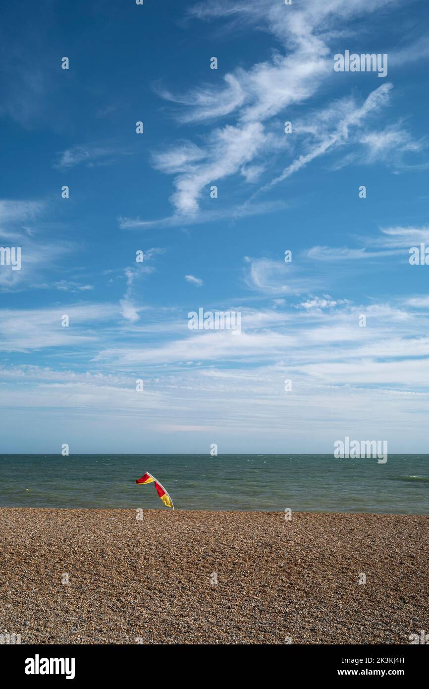 Lifeguard flags on the beach at Hastings in West Sussex Stock Photo - Alamy