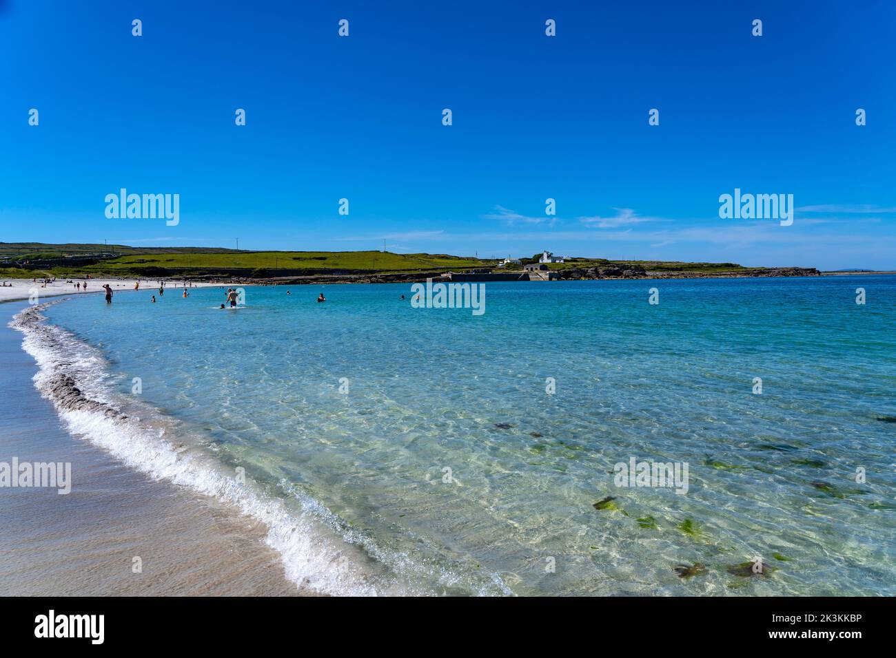 The azure waters of Kilmurvey beach, Inishmore, the largest of the Aran ...