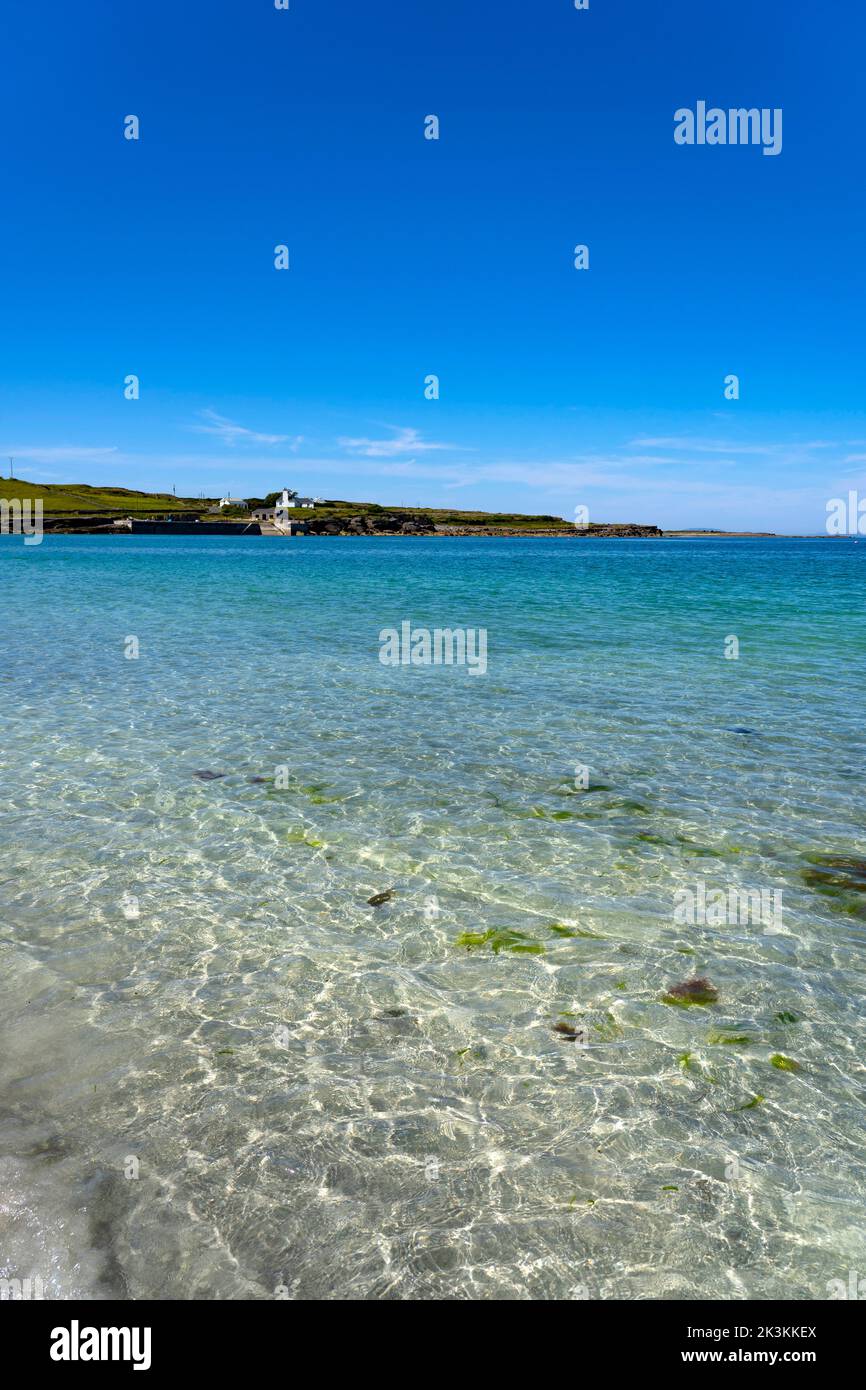 The azure waters of Kilmurvey beach, Inishmore, the largest of the Aran ...