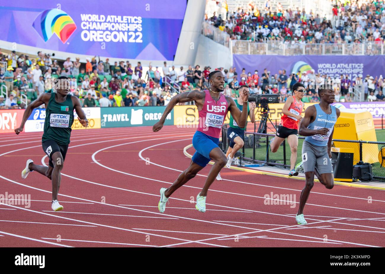 Muzala Samukonga, Michael Cherry and Bayapo Ndori competing in the 400m ...