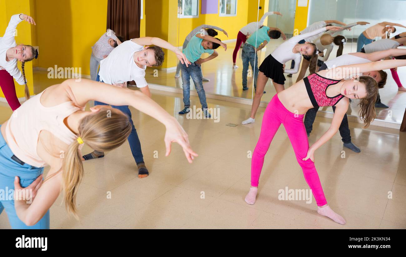 Children participating in dance class with teacher Stock Photo - Alamy