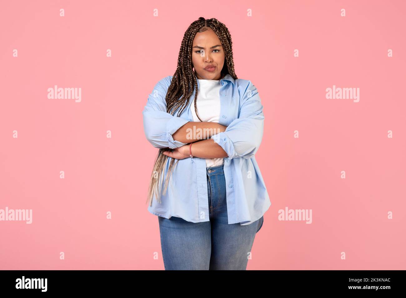 Discontented African Overweight Woman Posing Crossing Hands Over Pink ...