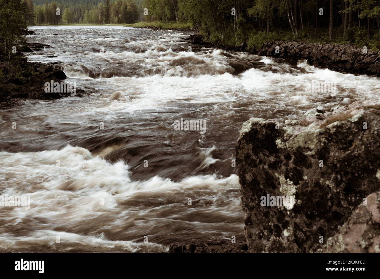 A beautiful shot of splashing river waves in a rocky stream Stock Photo ...