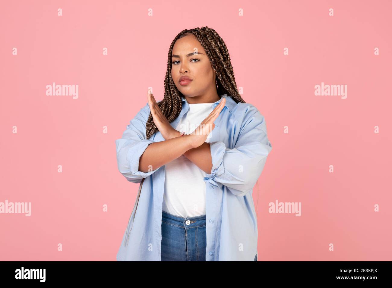 Woman crossing arms stop gesture hi-res stock photography and images ...