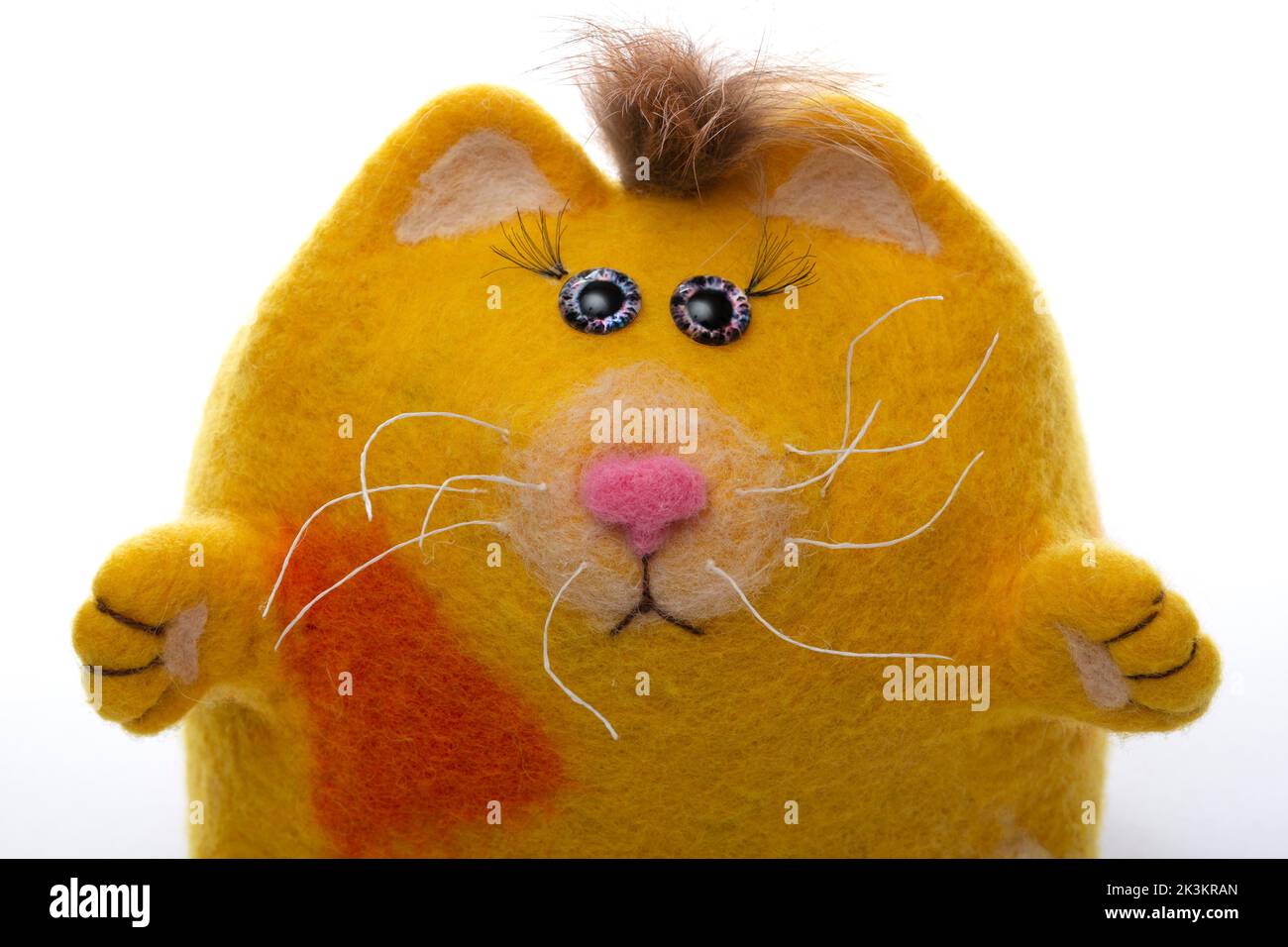 Yellow cat - soft toy made of felt wool Stock Photo - Alamy
