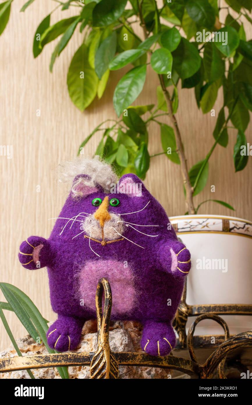 Purple cat - soft toy made of felted wool Stock Photo - Alamy