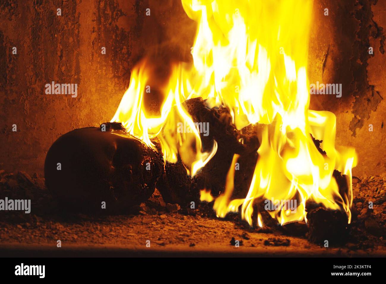 plastic doll burns with bright fire Stock Photo - Alamy