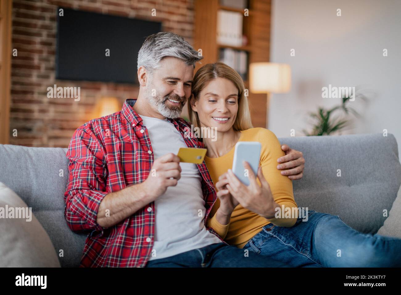 Wife banking hi-res stock photography and images - Alamy