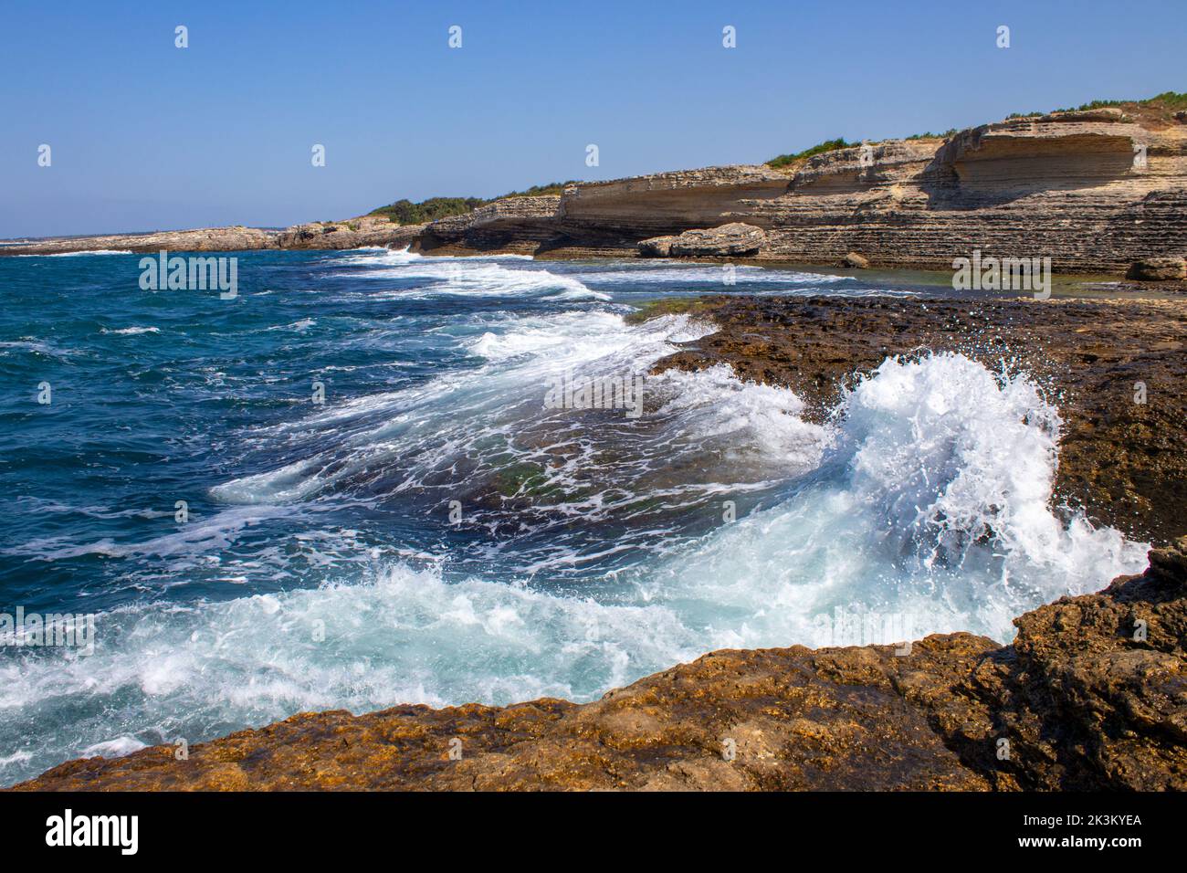 The crashing of violent waves on the rocks. The harsh waves of the ...