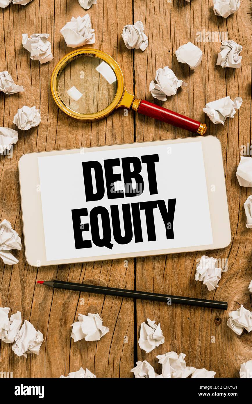 Text caption presenting Debt Equity. Business approach dividing ...