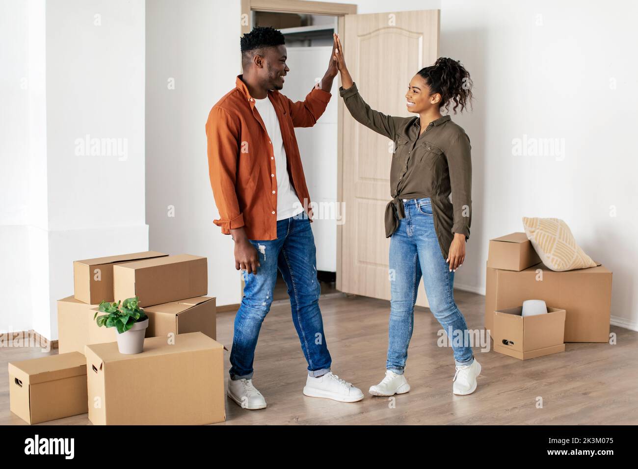 Black spouses celebrating moving hi-res stock photography and images ...
