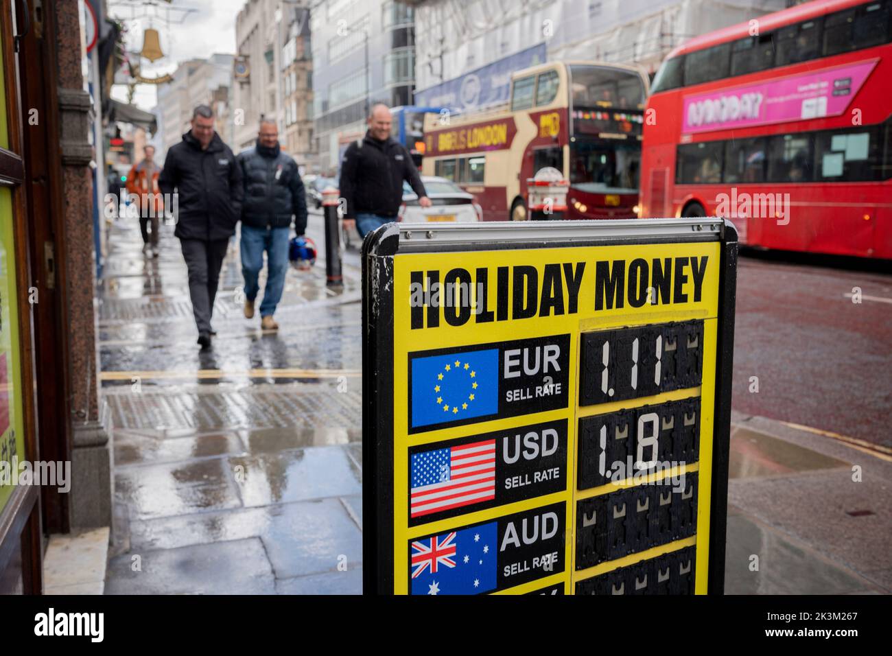 Foreign currency exchange rates are displayed in Fleet Street for the ...