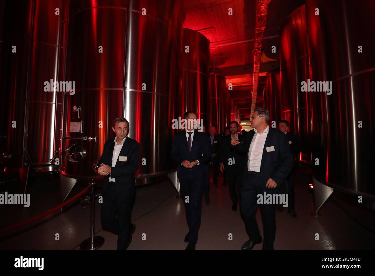 Prime Minister Alexander De Croo (C) receives a guided tour at the ...