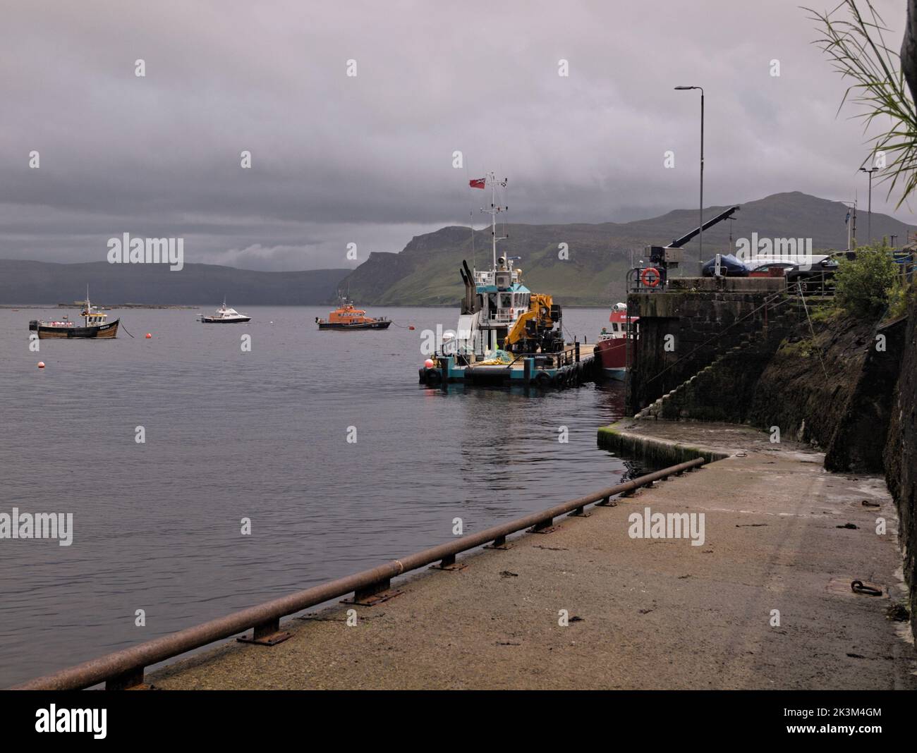 Fishing boats and the dock at Portree harbour, Loch Portree, Isle of ... Fishing boats and the dock at Portree harbour, Loch Portree, Isle of ...