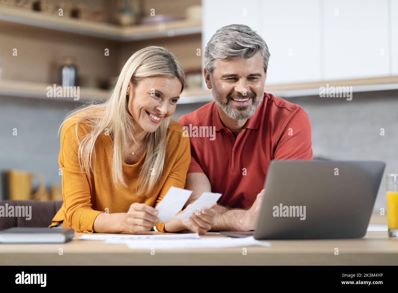 Adult couple working on documents hi-res stock photography and images ...