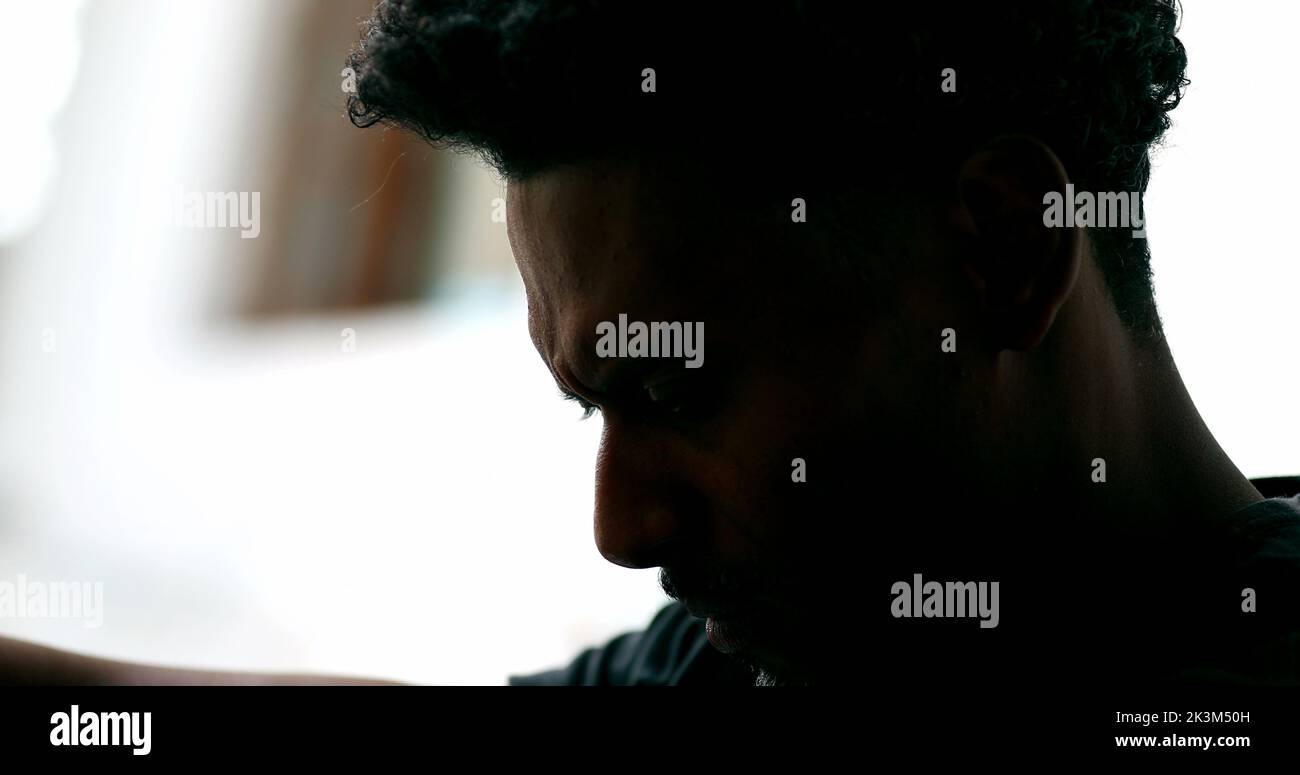 Sad depressed man feeling anxiety and despair Stock Photo - Alamy