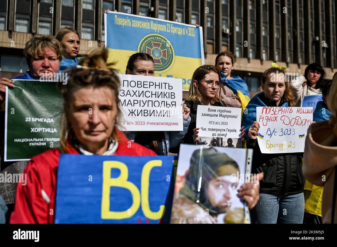 ZAPORIZHZHIA, UKRAINE - SEPTEMBER 25, 2022 - Activists hold placards ...