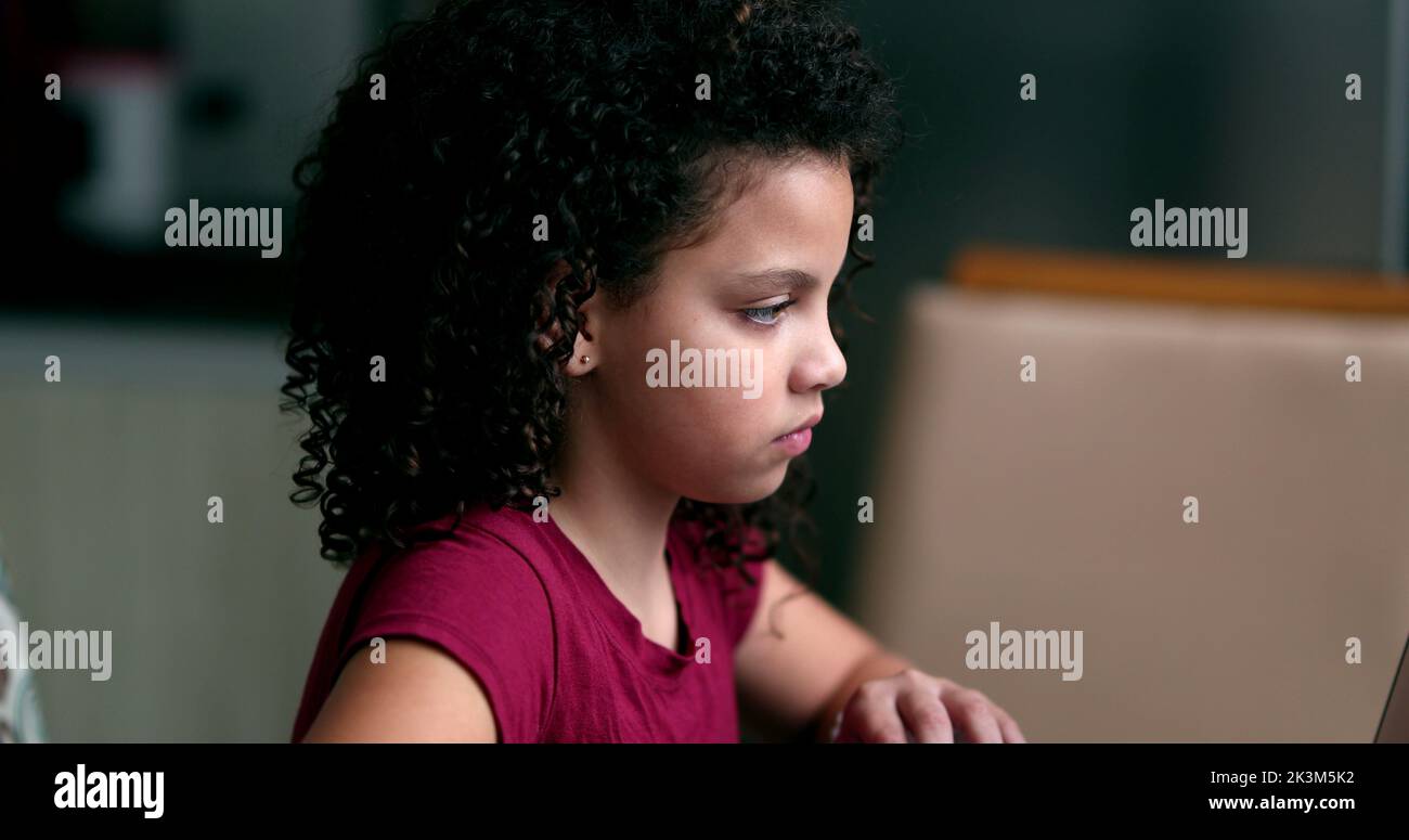 Little girl kid using laptop. Child browsing internet on computer Stock ...