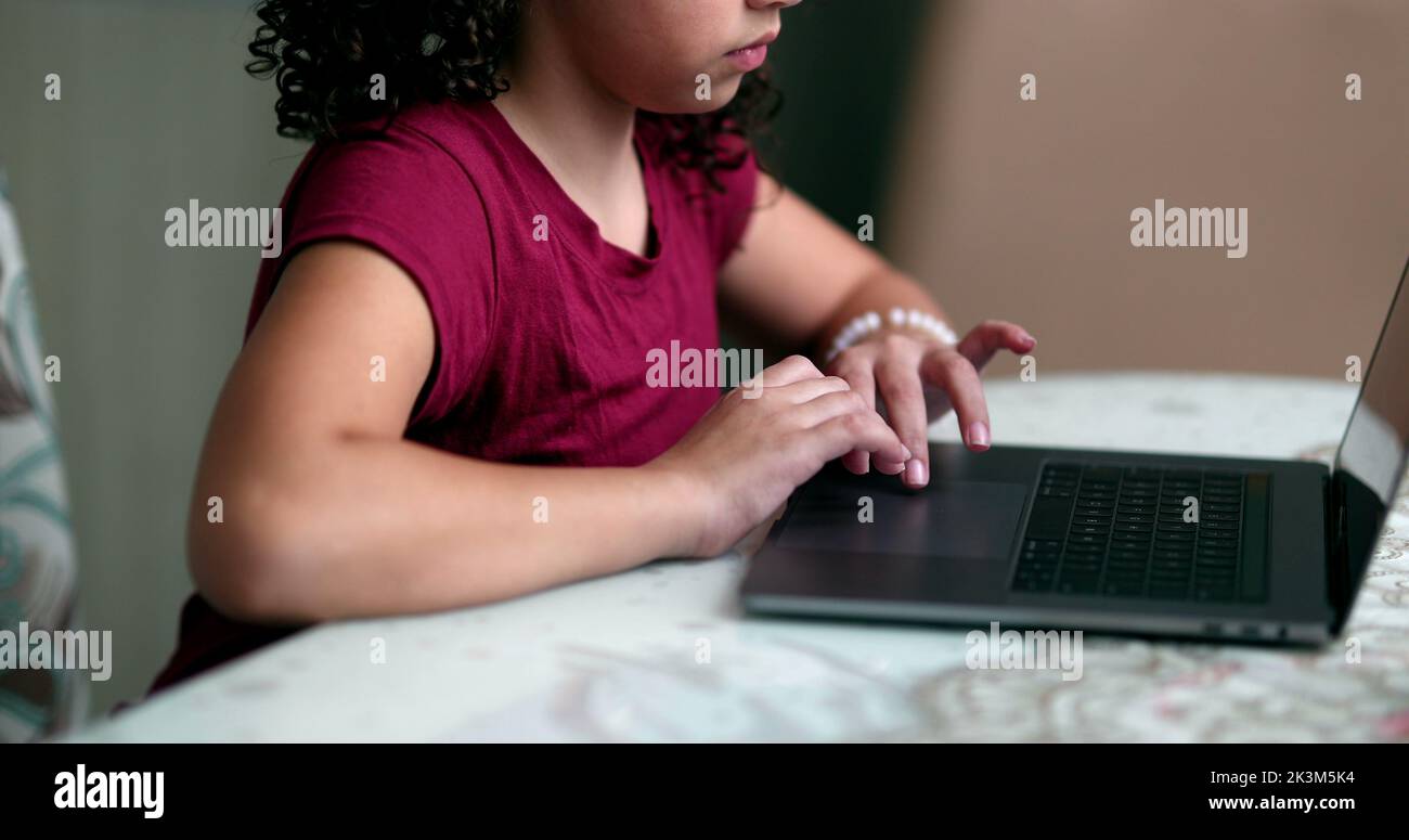 Little girl kid using laptop. Child browsing internet on computer Stock ...