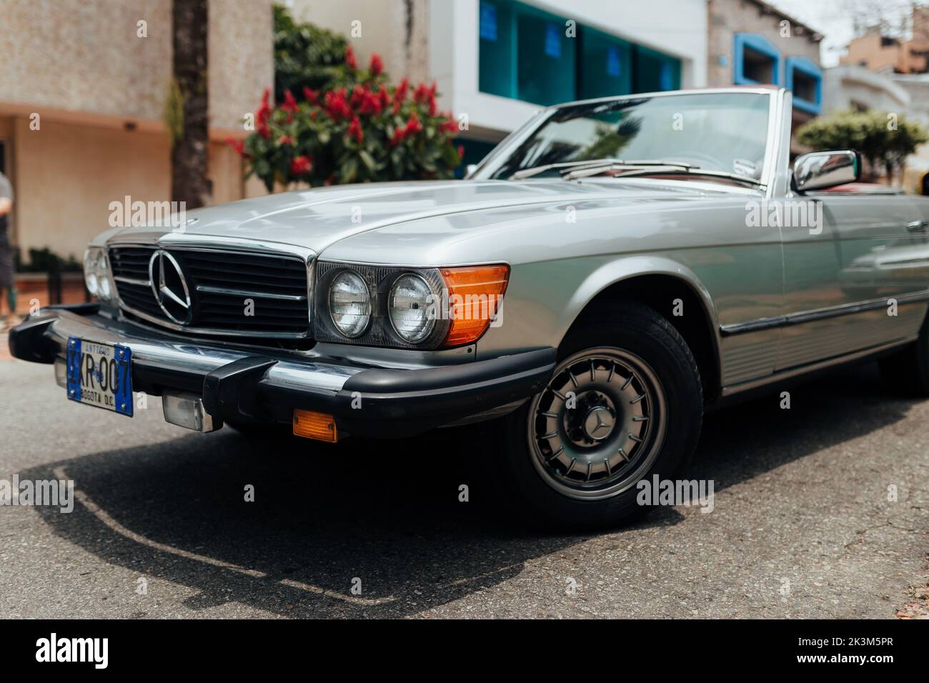 A beautiful shot of a front bumper and headlights of a vintage Mercedes ...