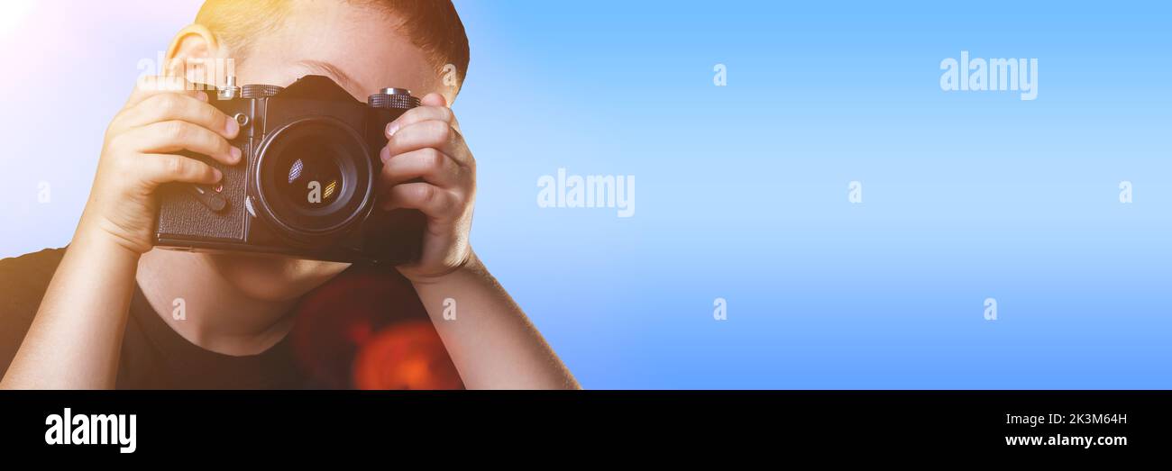 Baby and vintage camera. Beginner photographer. Photography courses ...