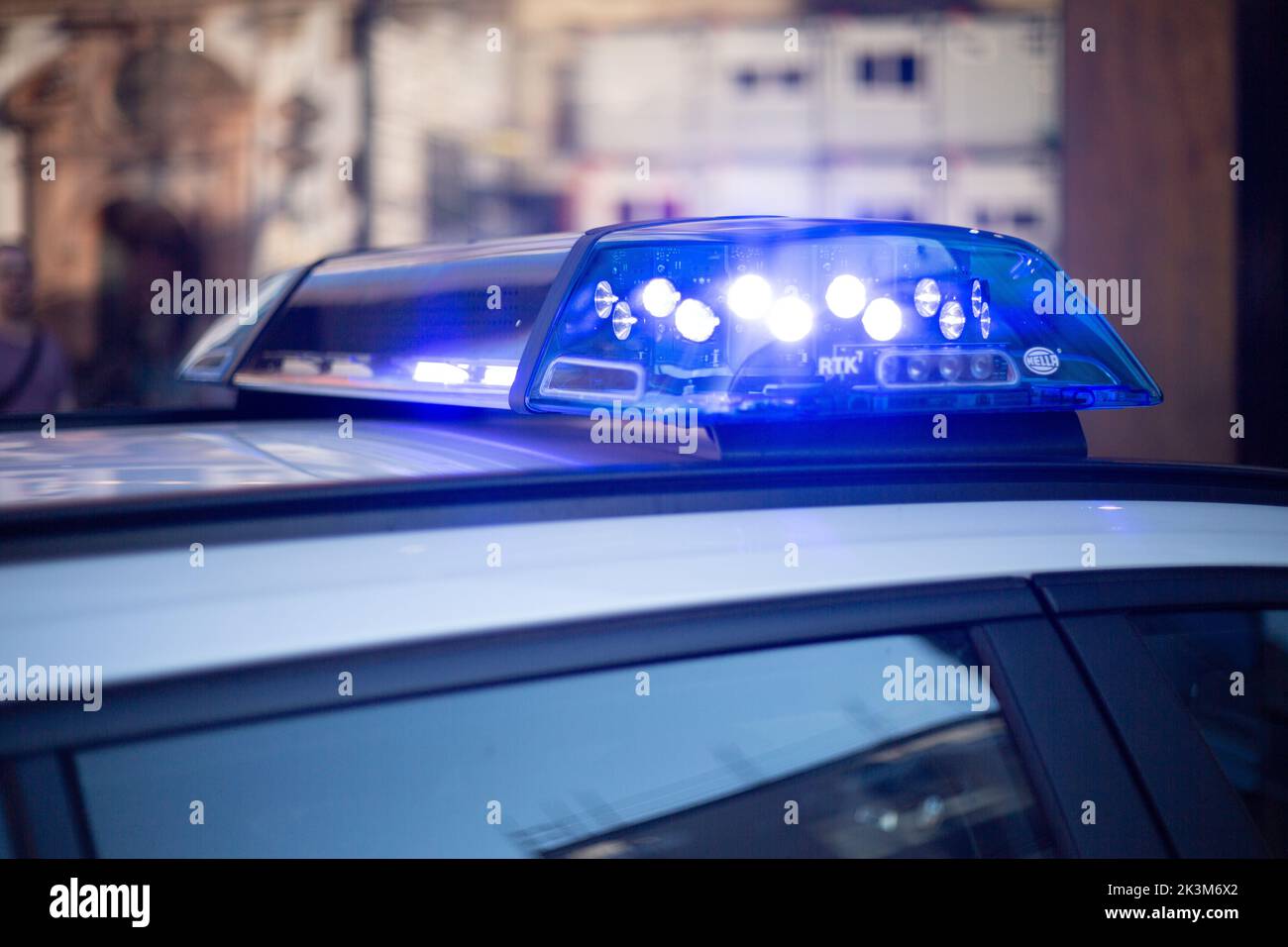 Police car with bluelight in operation in Munich, Germany. (Photo by ...