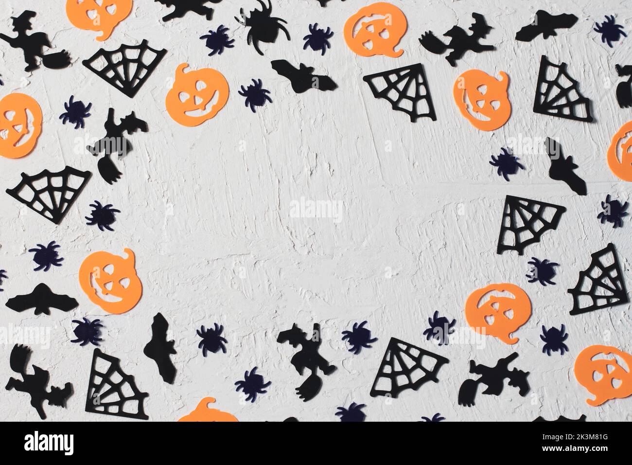 Halloween frame with pumpkins, ghosts, witches, bats, cobwebs. Halloween party invitation card ...