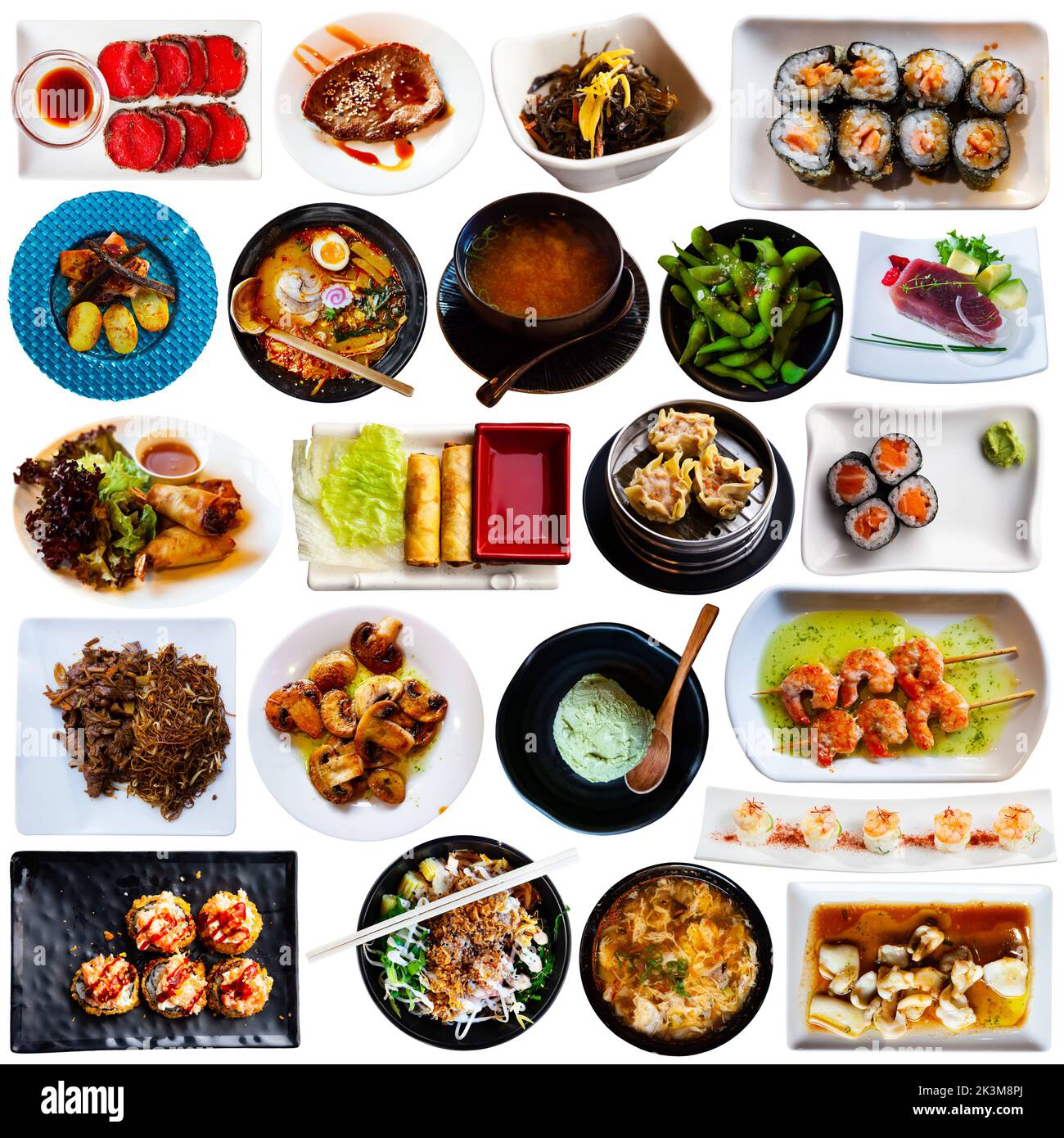 Tasty different dishes of japanese cuisine served at plates Stock Photo ...
