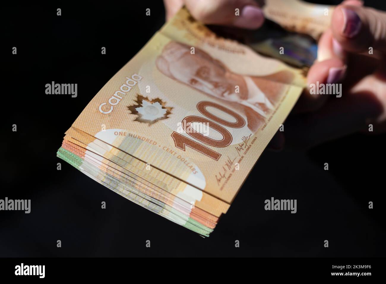 Hands giving taking dollars hi-res stock photography and images - Alamy