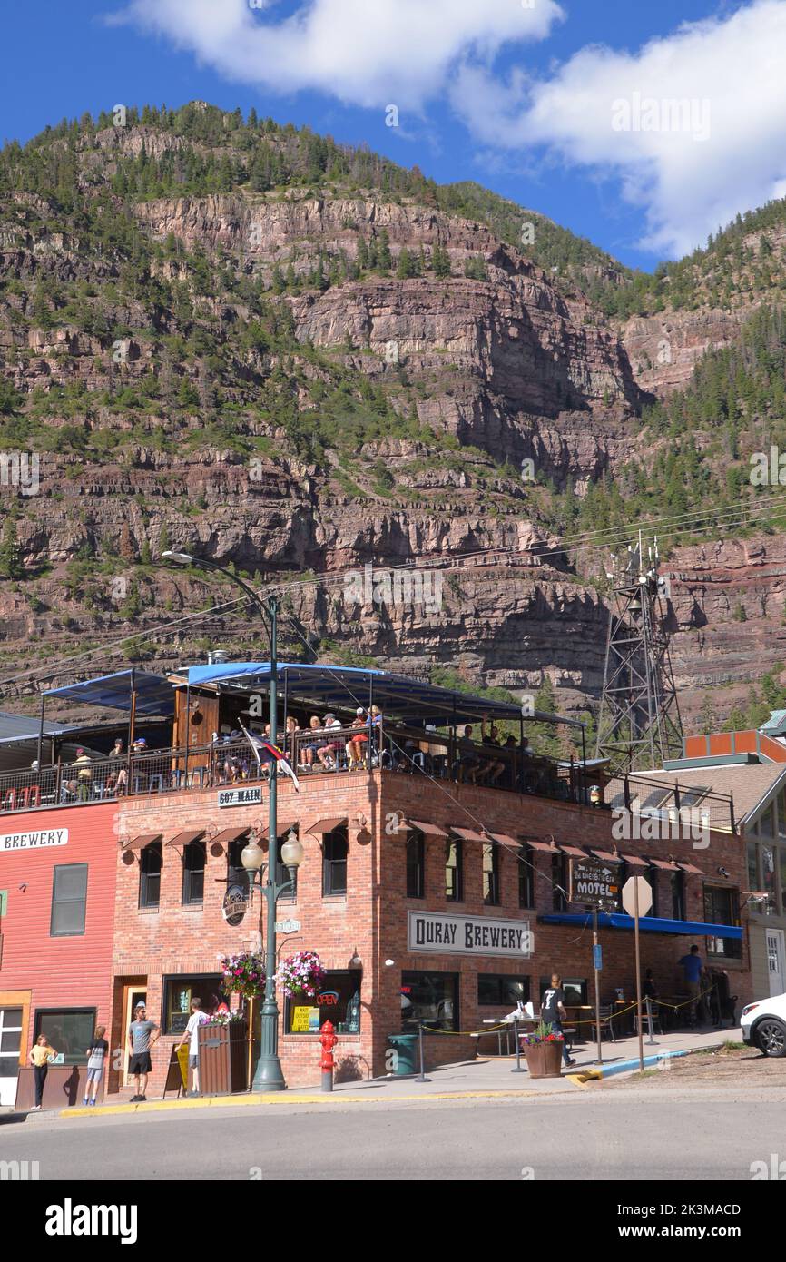 The popular tourist town of Ouray with mountains in the background in ...