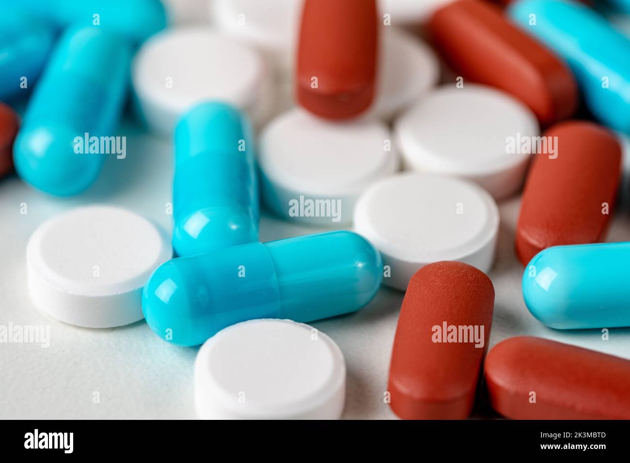 A closeup of different types of medicines on the table. Concept of ...