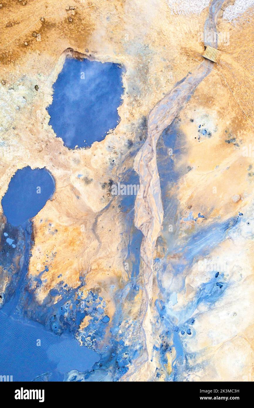 Aerial top view of blue mud in rough crater in Hverir geothermal area ...