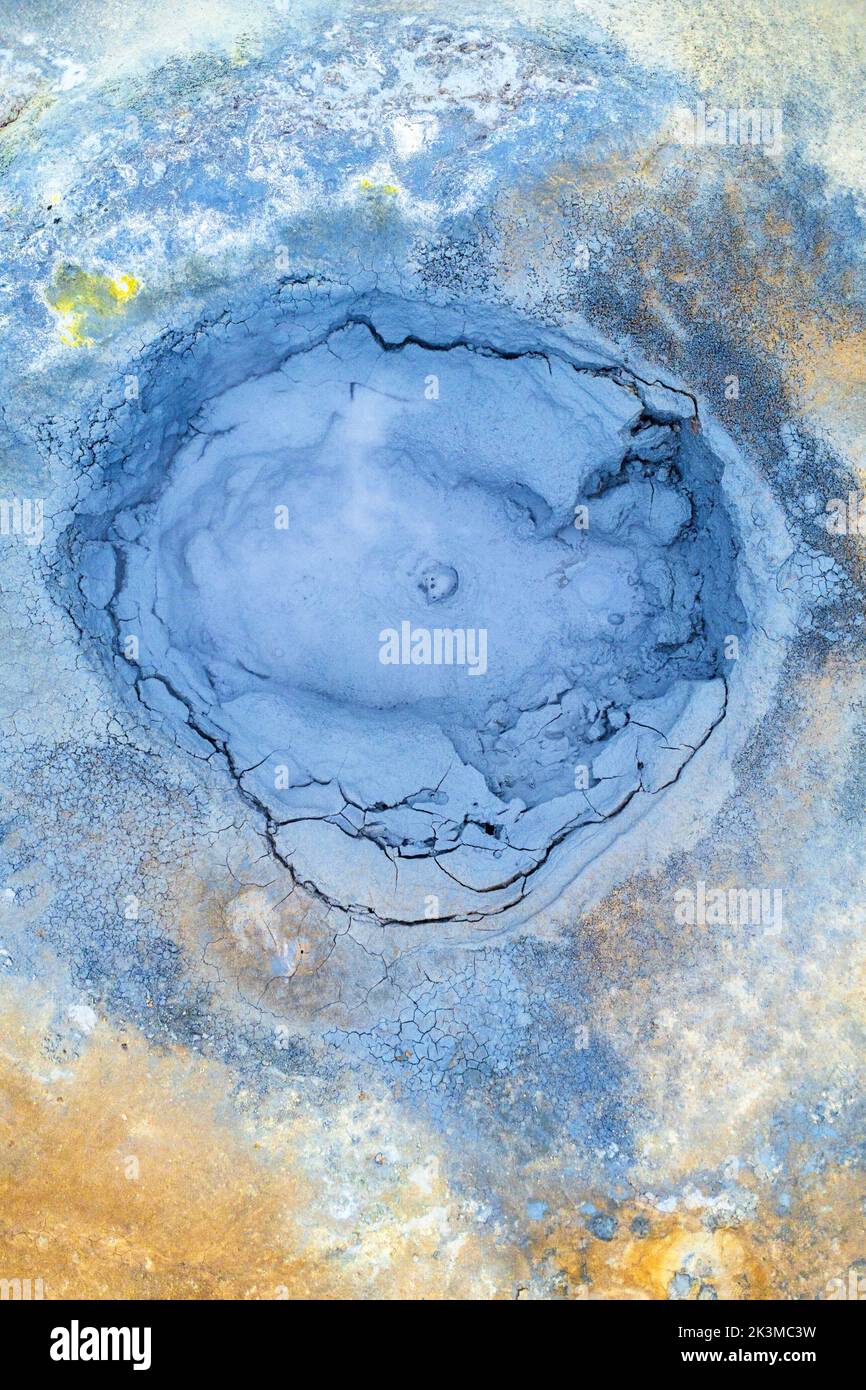 Aerial top view of blue mud bubbling in rough crater in Hverir ...