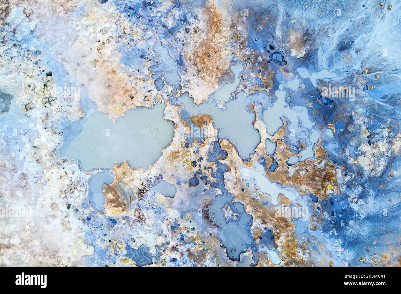Aerial top view of blue mud in rough crater in Hverir geothermal area ...