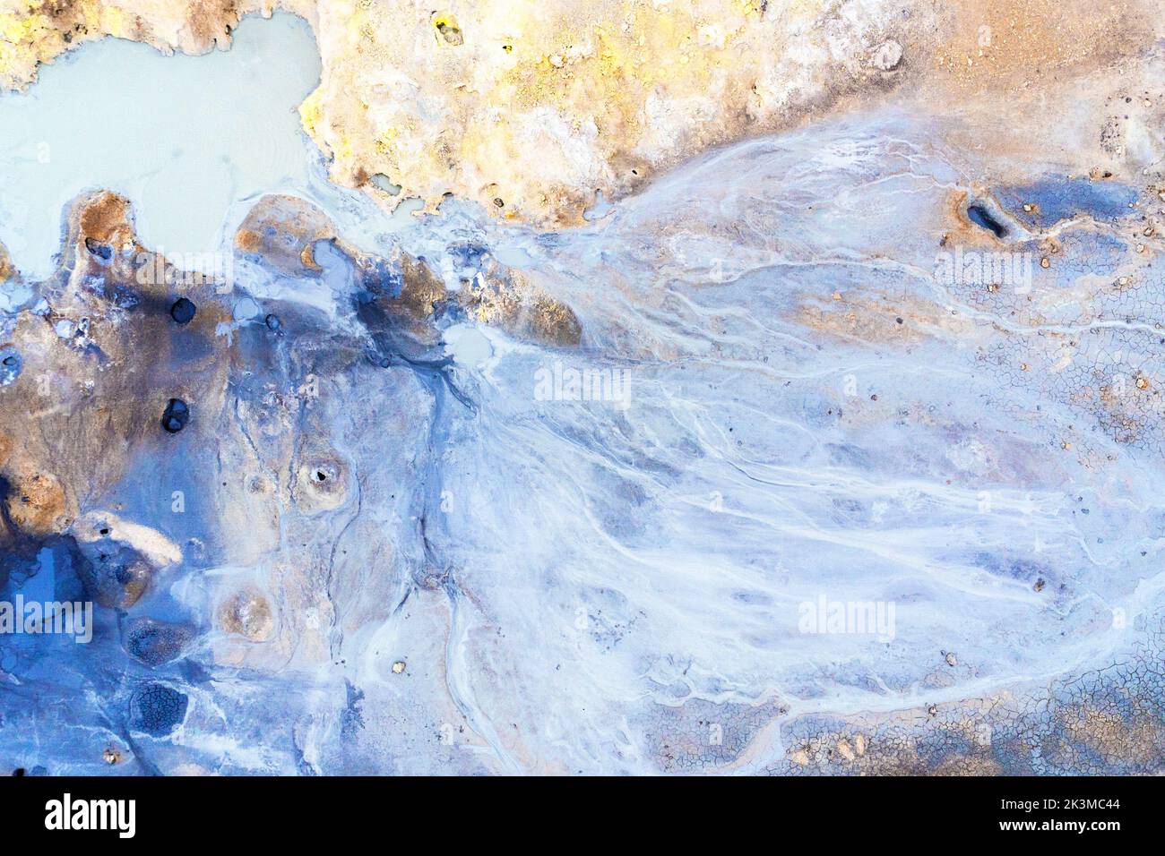 Aerial top view of blue mud in rough crater in Hverir geothermal area ...