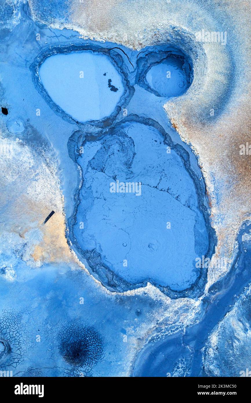 Aerial top view of blue mud bubbling in rough crater in Hverir ...