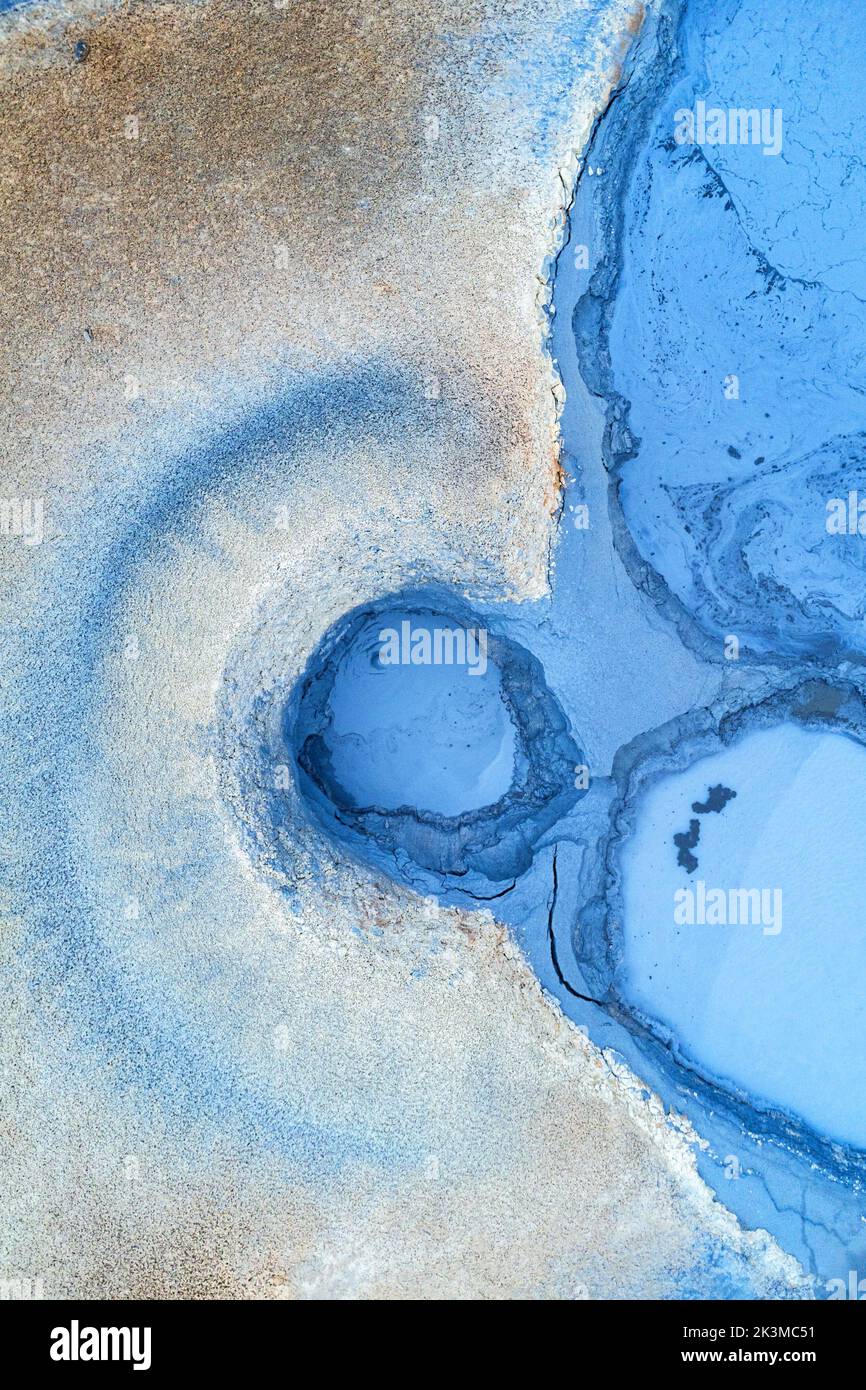 Aerial top view of blue mud bubbling in rough crater in Hverir ...