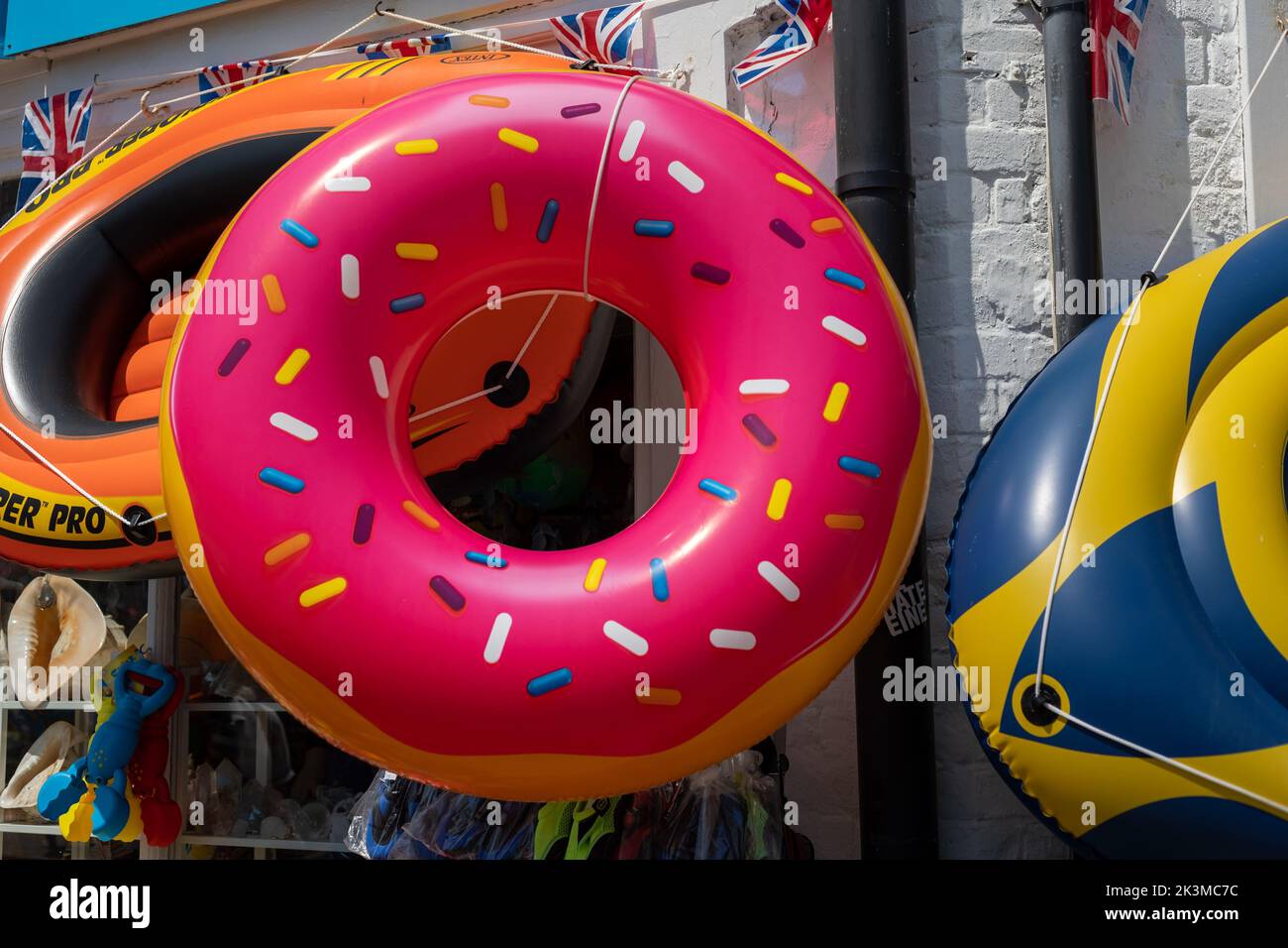 Large colorful inflatables that look like doughnuts Stock Photo - Alamy