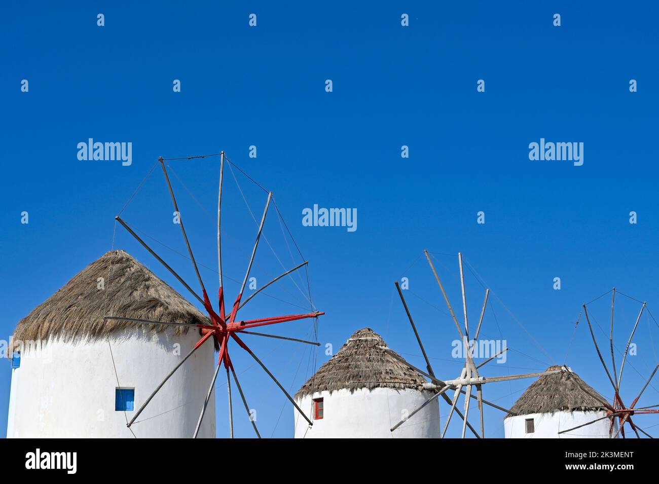 Mykonos, Greece - May 2022: Three of the famous traditional windmills ...