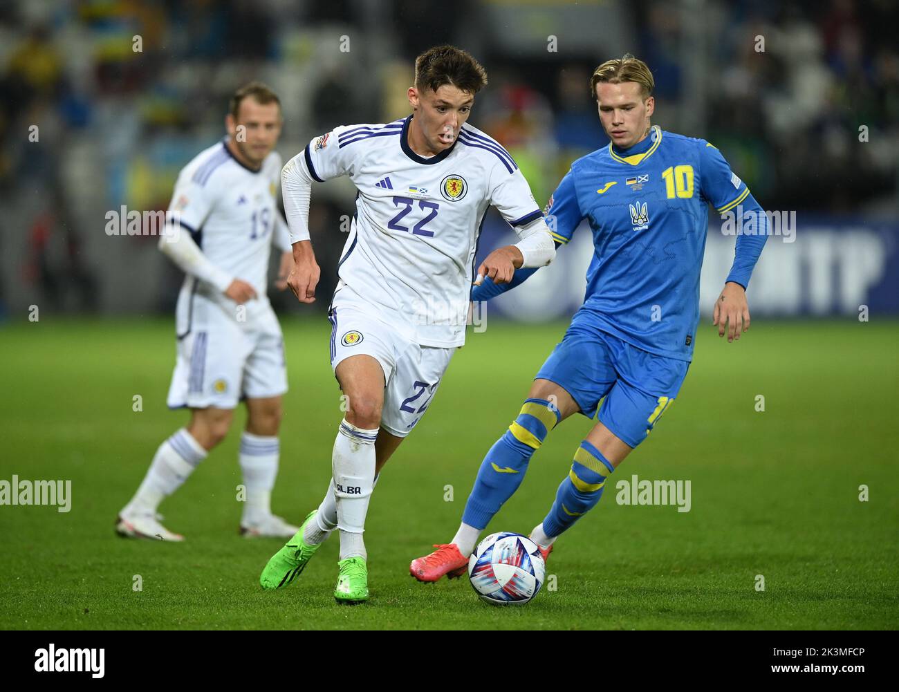 Scotland's Aaron Hickey (left) and Ukraine's Mykhailo Mudryk battle for ...