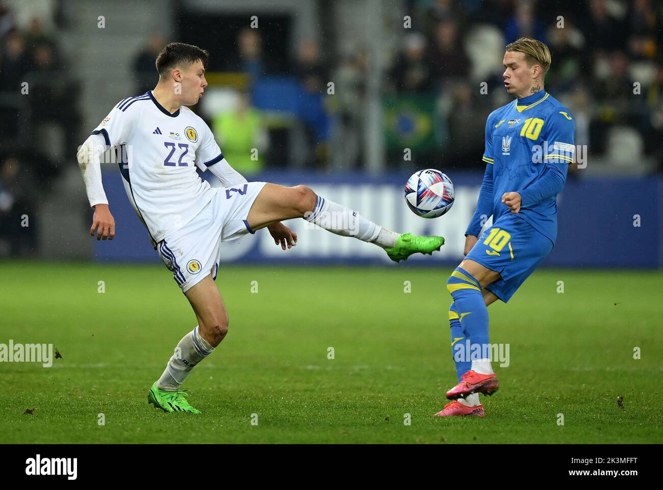 Scotland's Aaron Hickey (left) and Ukraine's Mykhailo Mudryk battle for ...